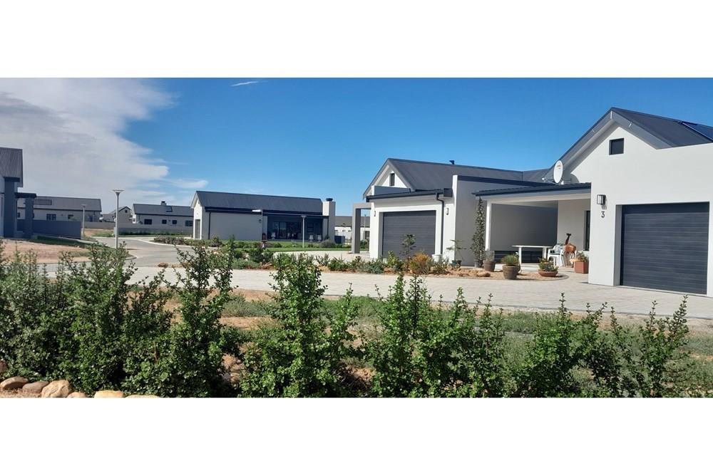 SAM COHEN REAL ESTATE powered by eXp